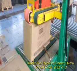 CARTON BOX TAPPING MACHINE by Standard Pack Engineering Company from ...
